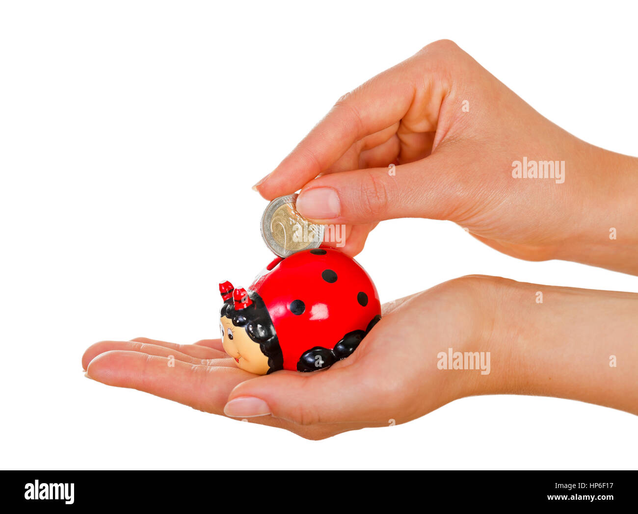 Picture of saving money on isolated background Stock Photo - Alamy