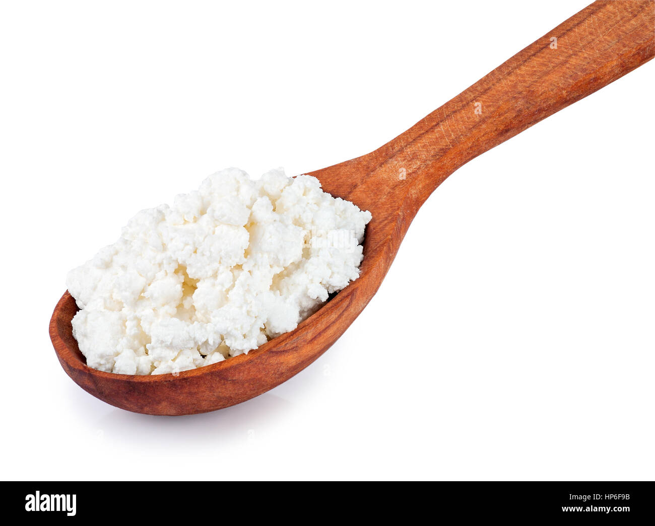dairy food cottage cheese. Fresh curd in wooden spoon isolated on white ...