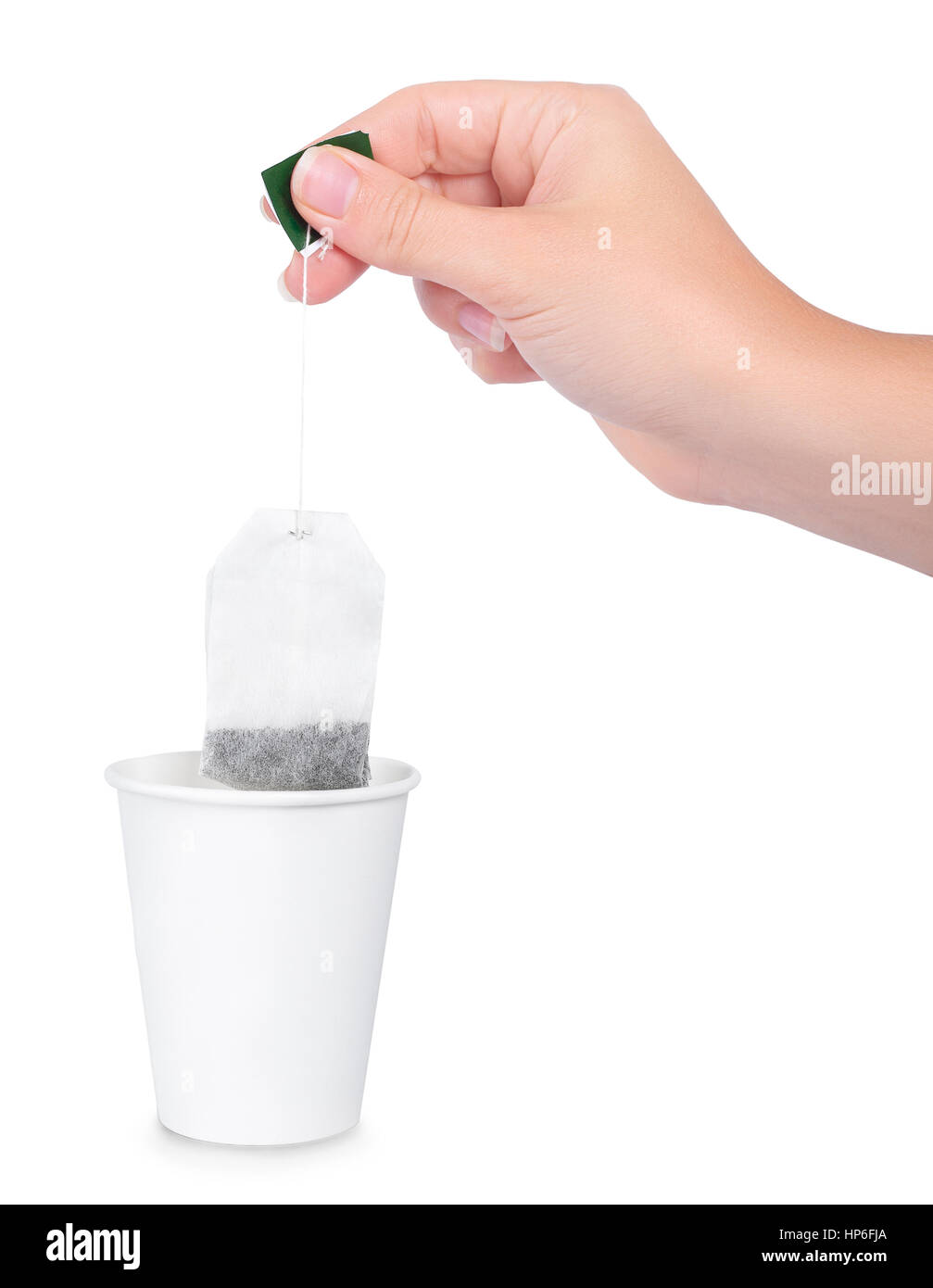 Woman hand with tea bag isolated on white background. Woman's hand ...