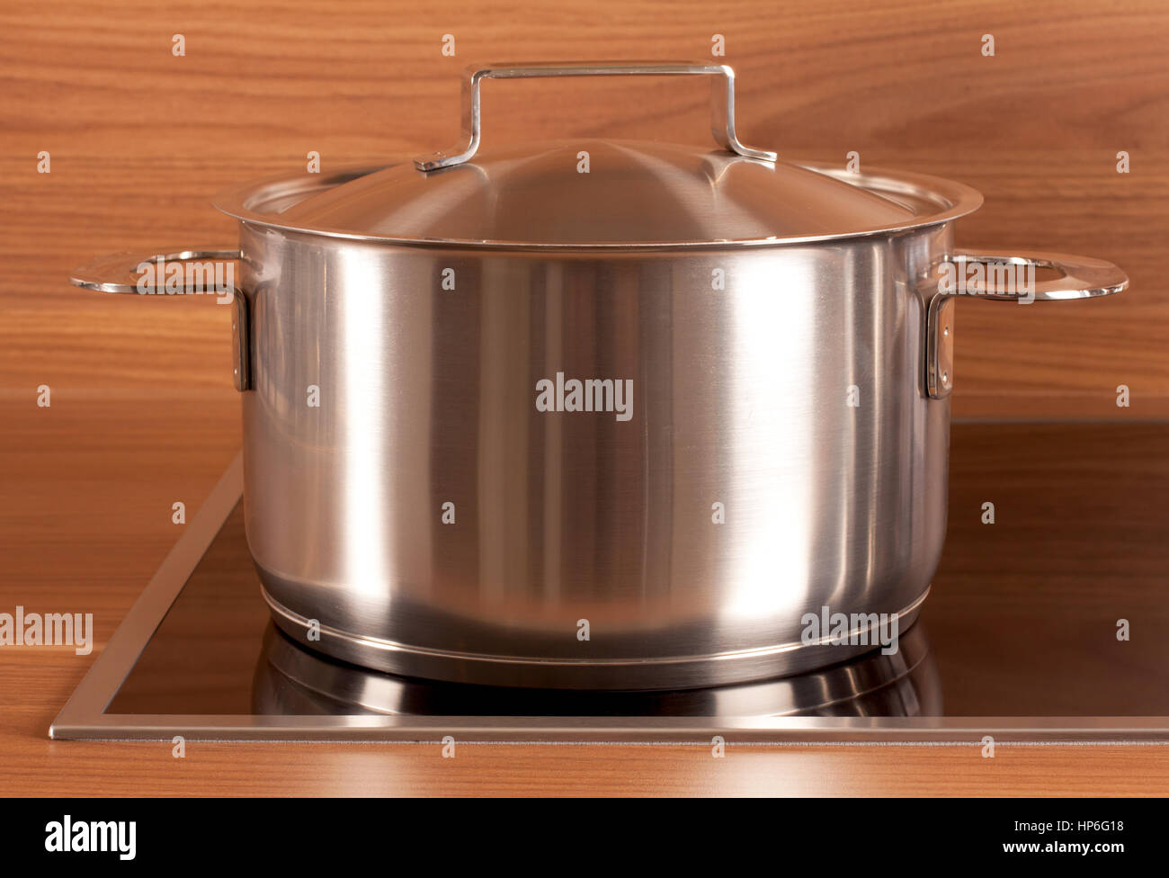Picture of an stainless steel cooking pot in the kitchen Stock Photo ...