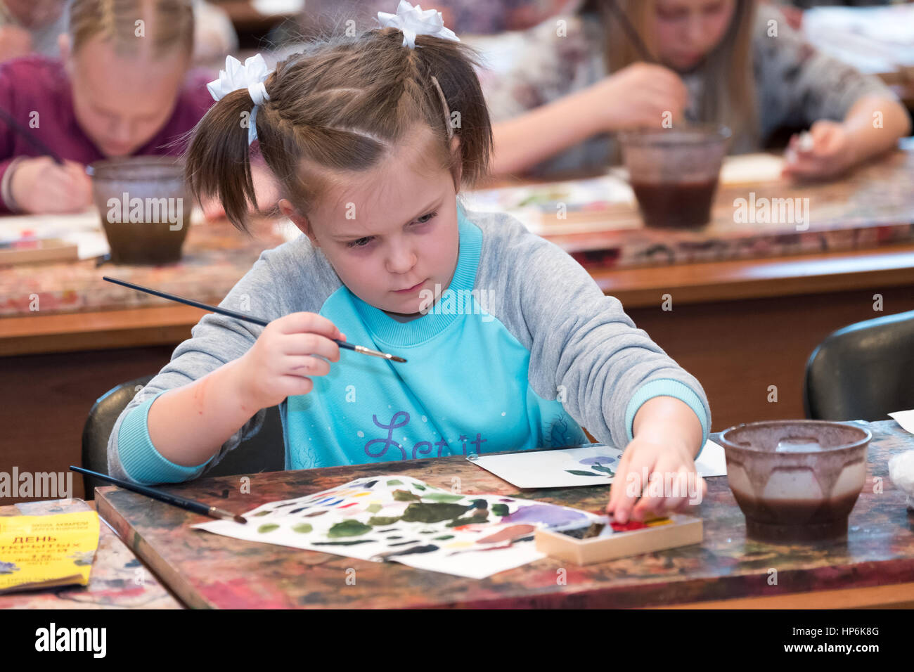 Children drawing in class during hi-res stock photography and images ...
