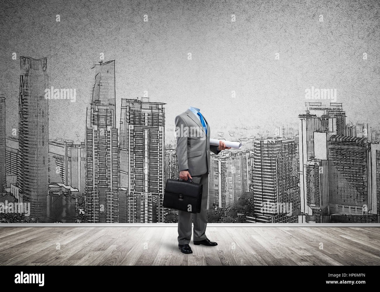 Headless engineer man with papers in hand against construction ...