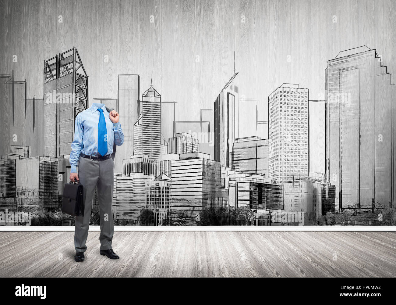 Headless engineer man with papers in hand against construction ...