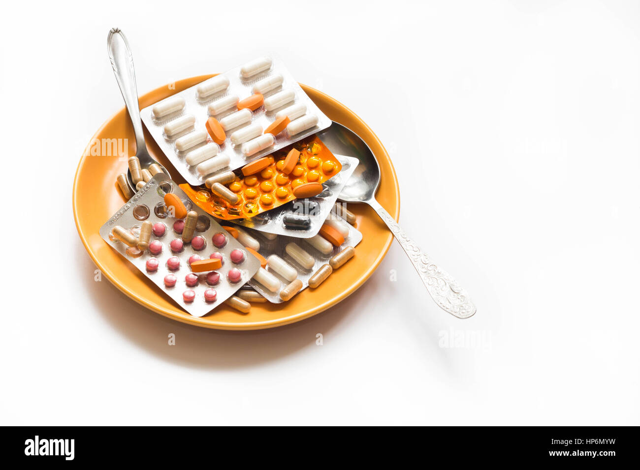 Medical tablets of the white background Stock Photo - Alamy