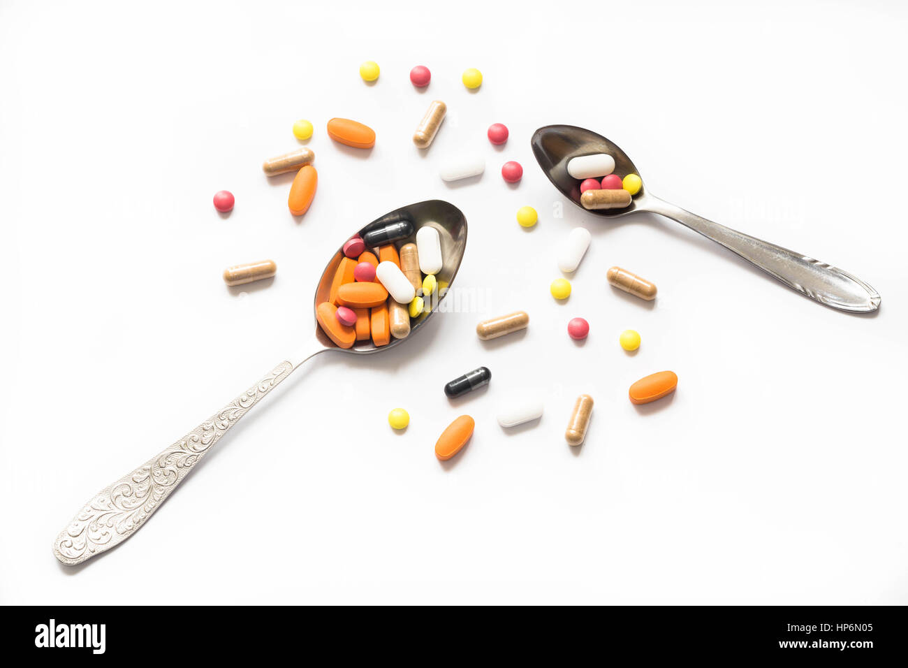 Medical tablets of the white background Stock Photo - Alamy