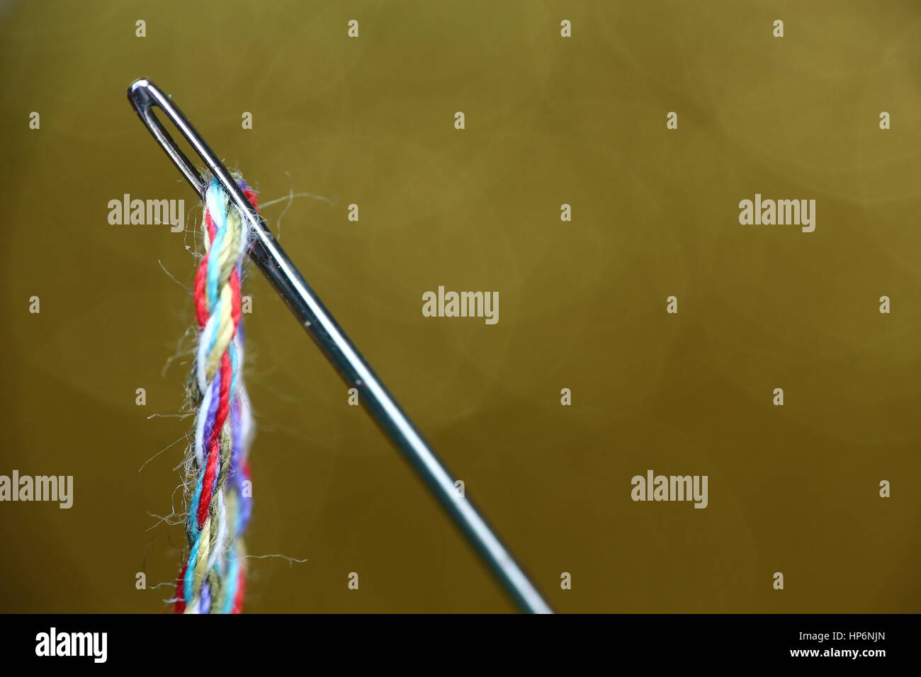 Needle and string Stock Photo - Alamy