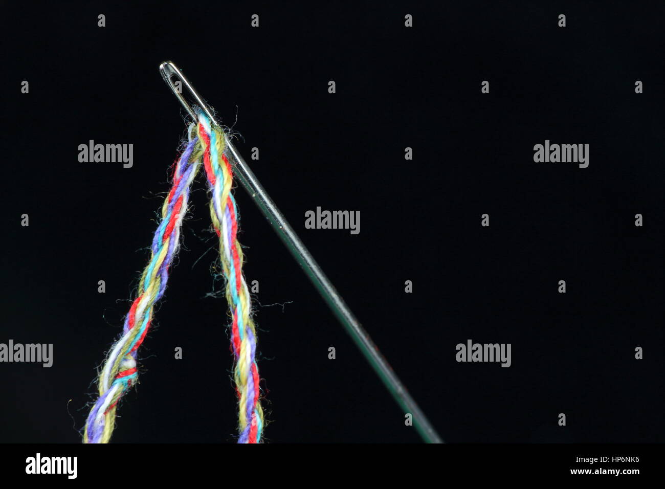 Needle and string Stock Photo - Alamy