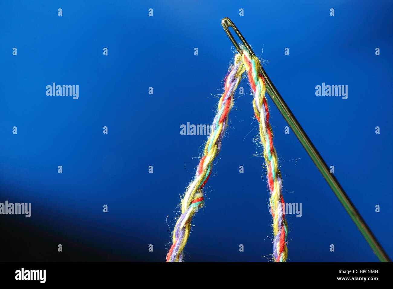 Needle and string Stock Photo - Alamy