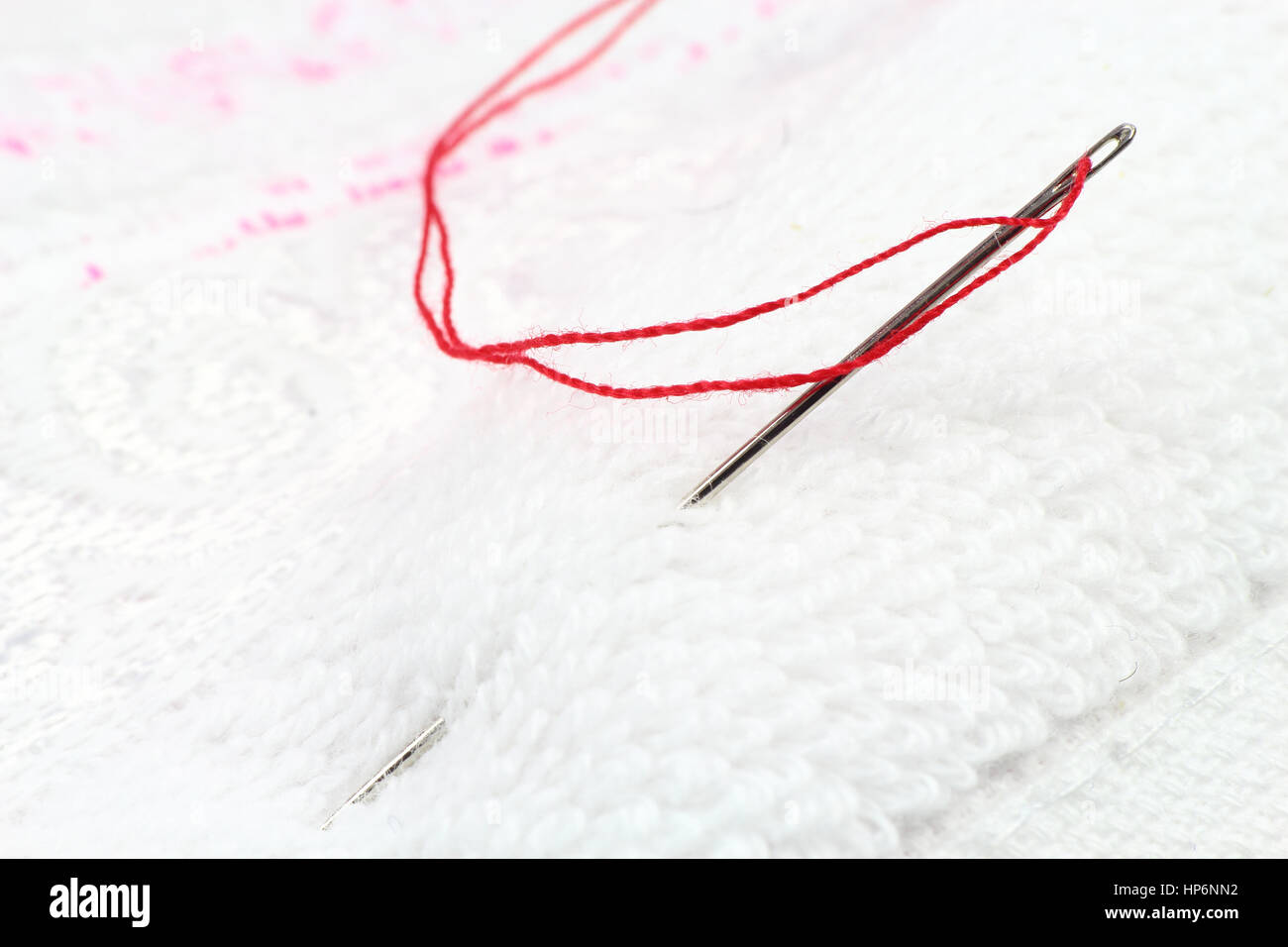 Needle and string Stock Photo - Alamy