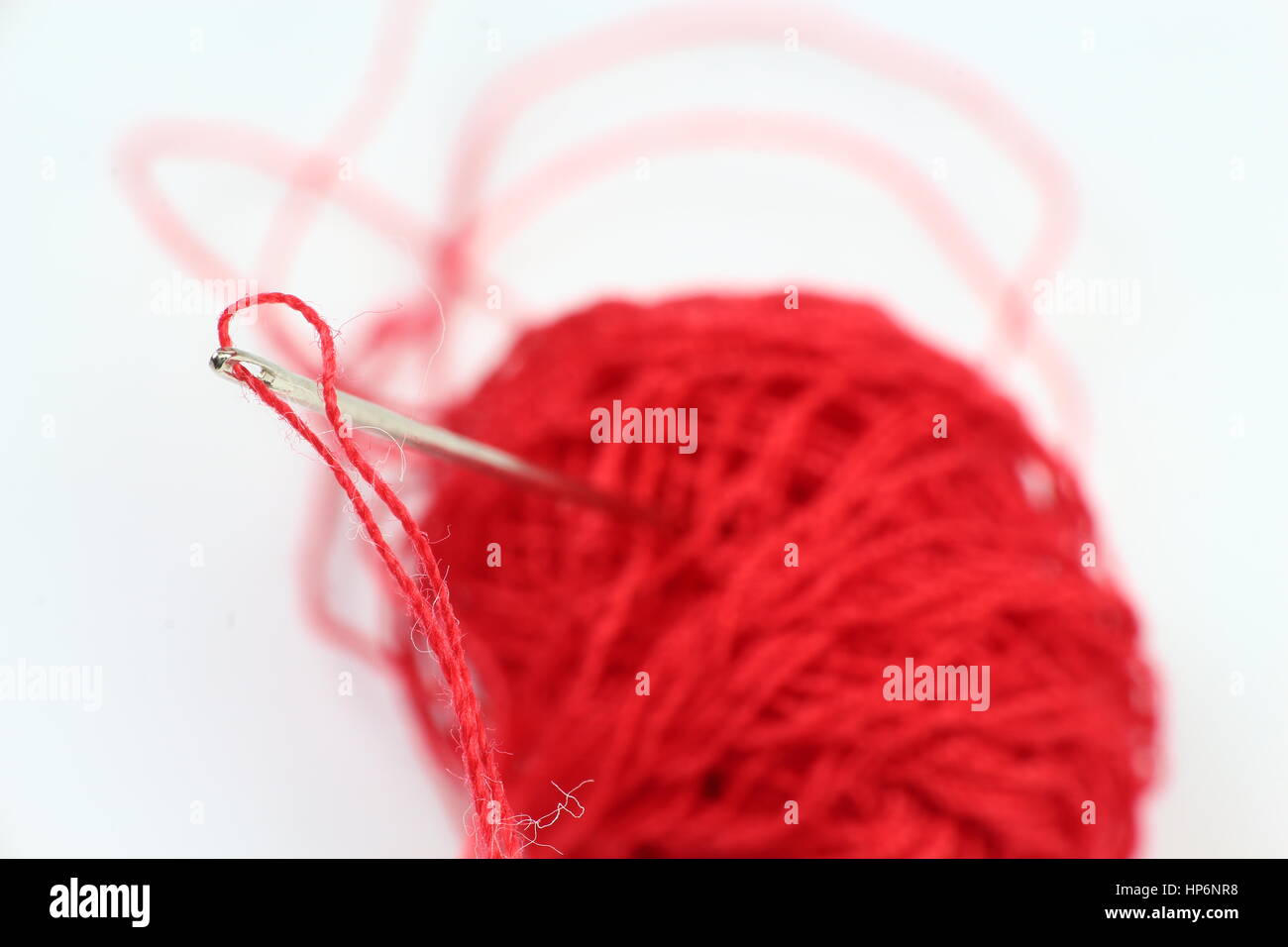 Needle and string Stock Photo - Alamy