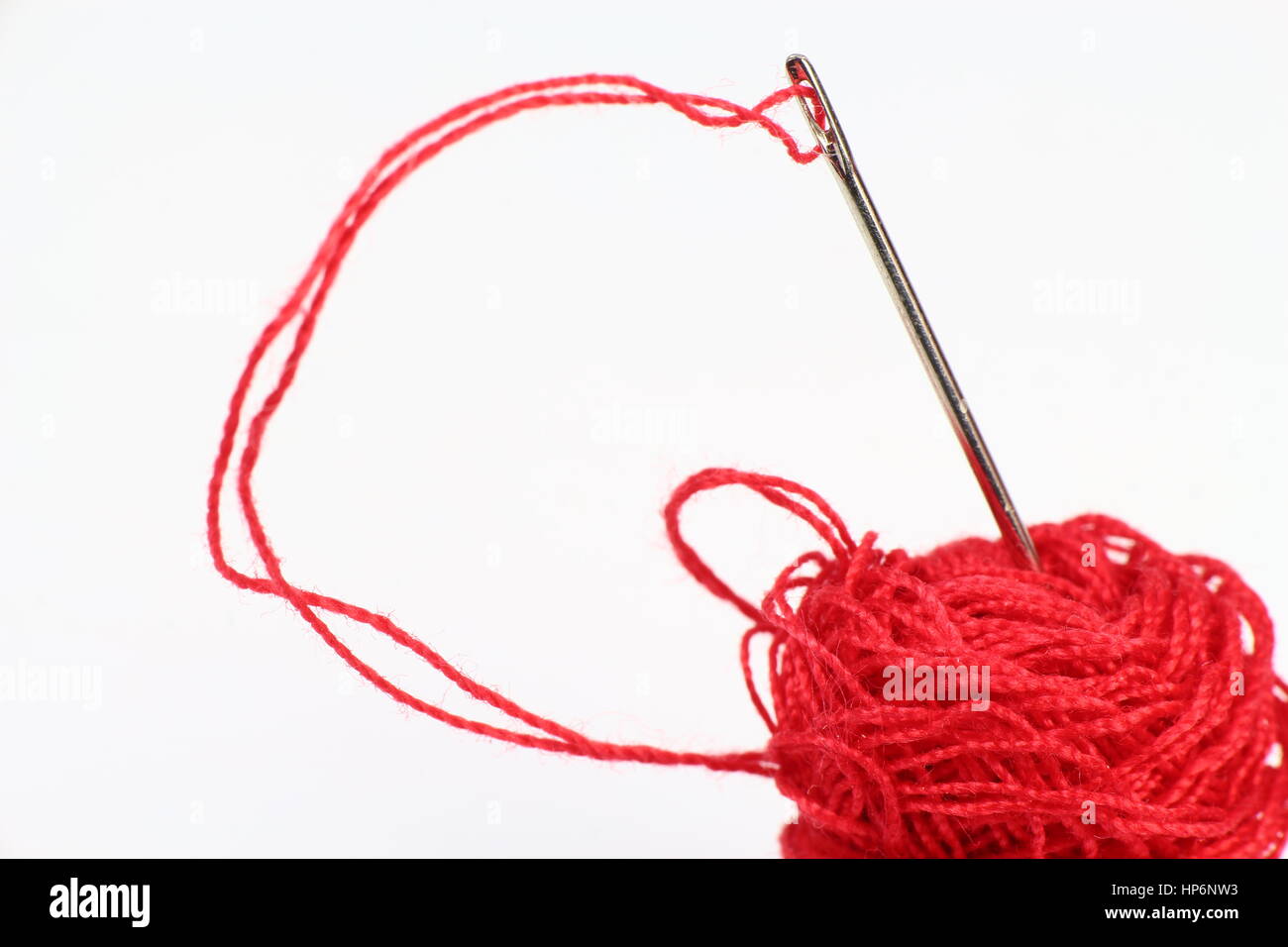 Needle and string Stock Photo - Alamy