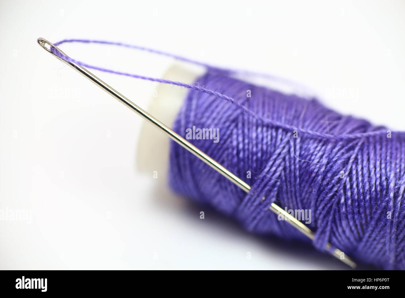 Needle and string Stock Photo - Alamy