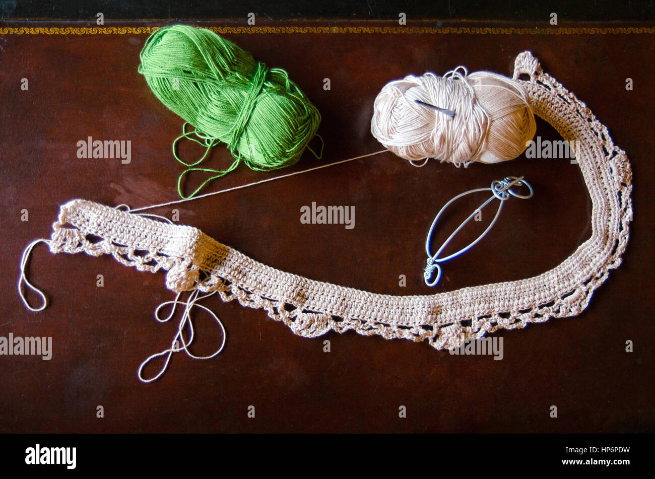 Crocheting accessories on a vintage table Stock Photo - Alamy