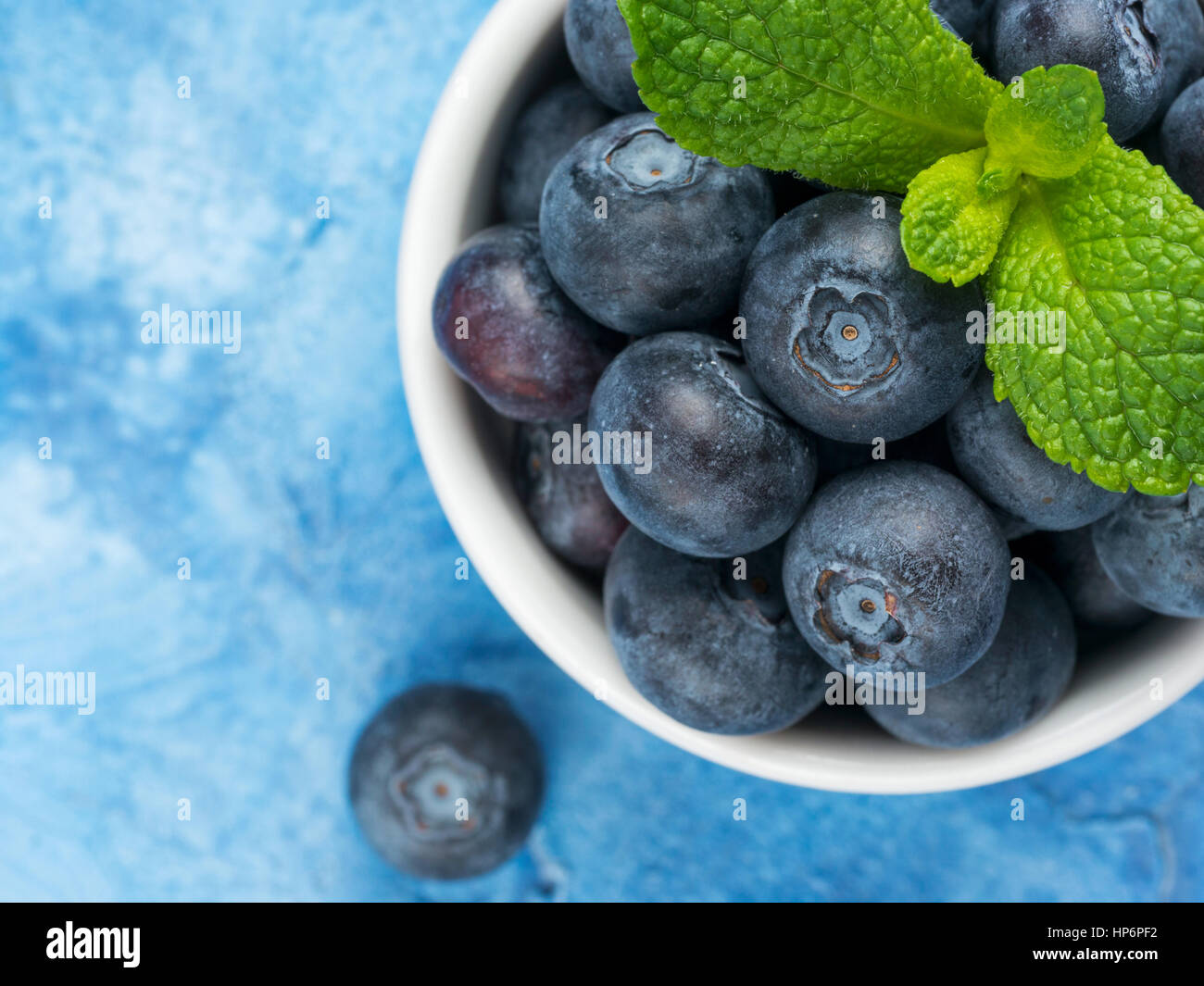 Freshly picked blueberries closeup. Ripe and juicy fresh blueberry with ...