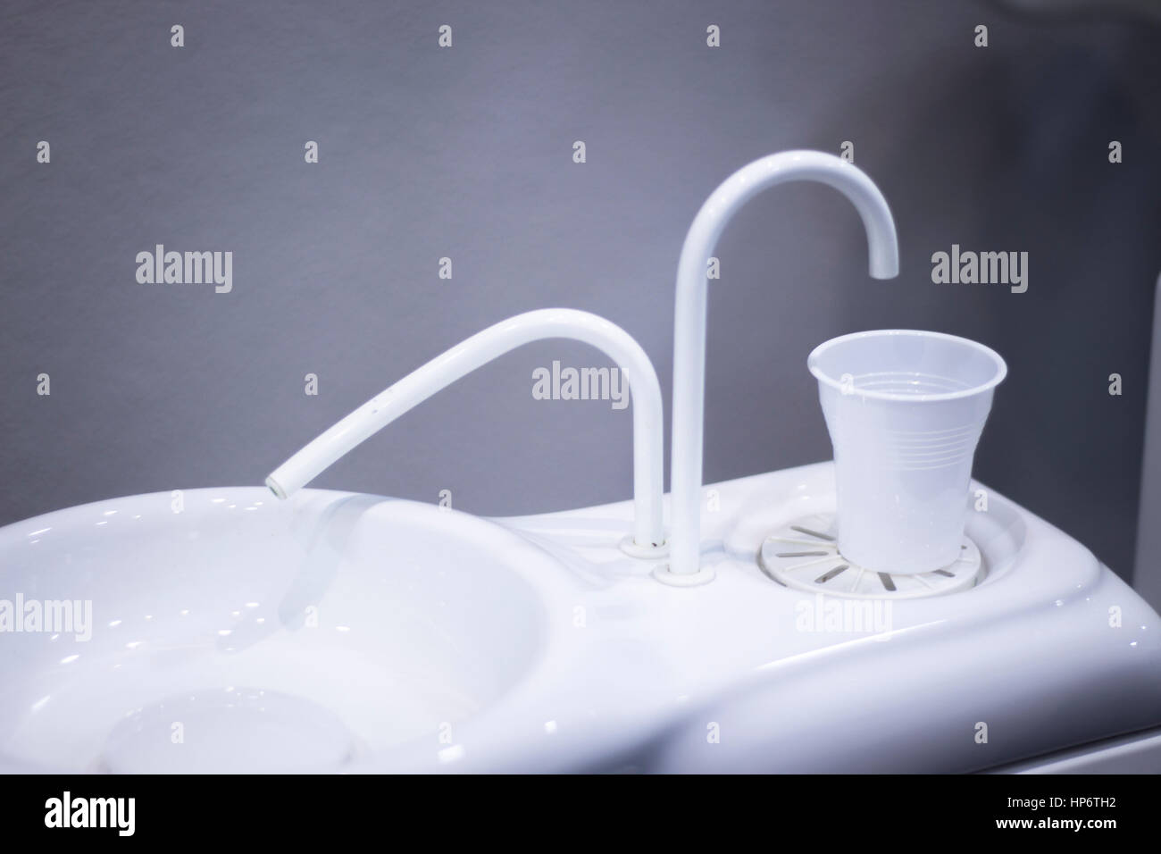 Dentists chair rinse basin in dental office for drilling and fillings ...