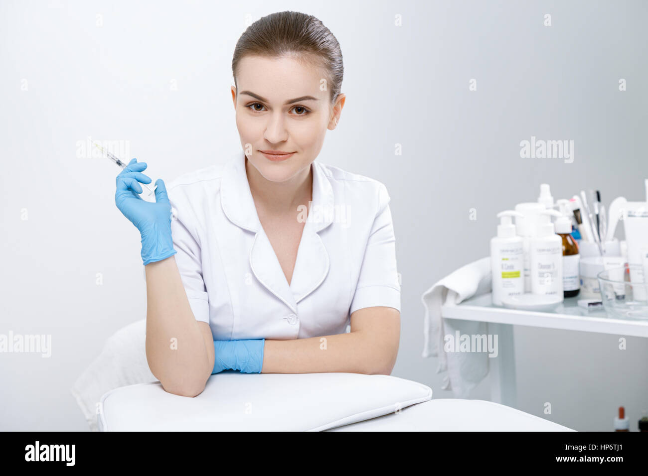 Doctor with syringe Stock Photo - Alamy