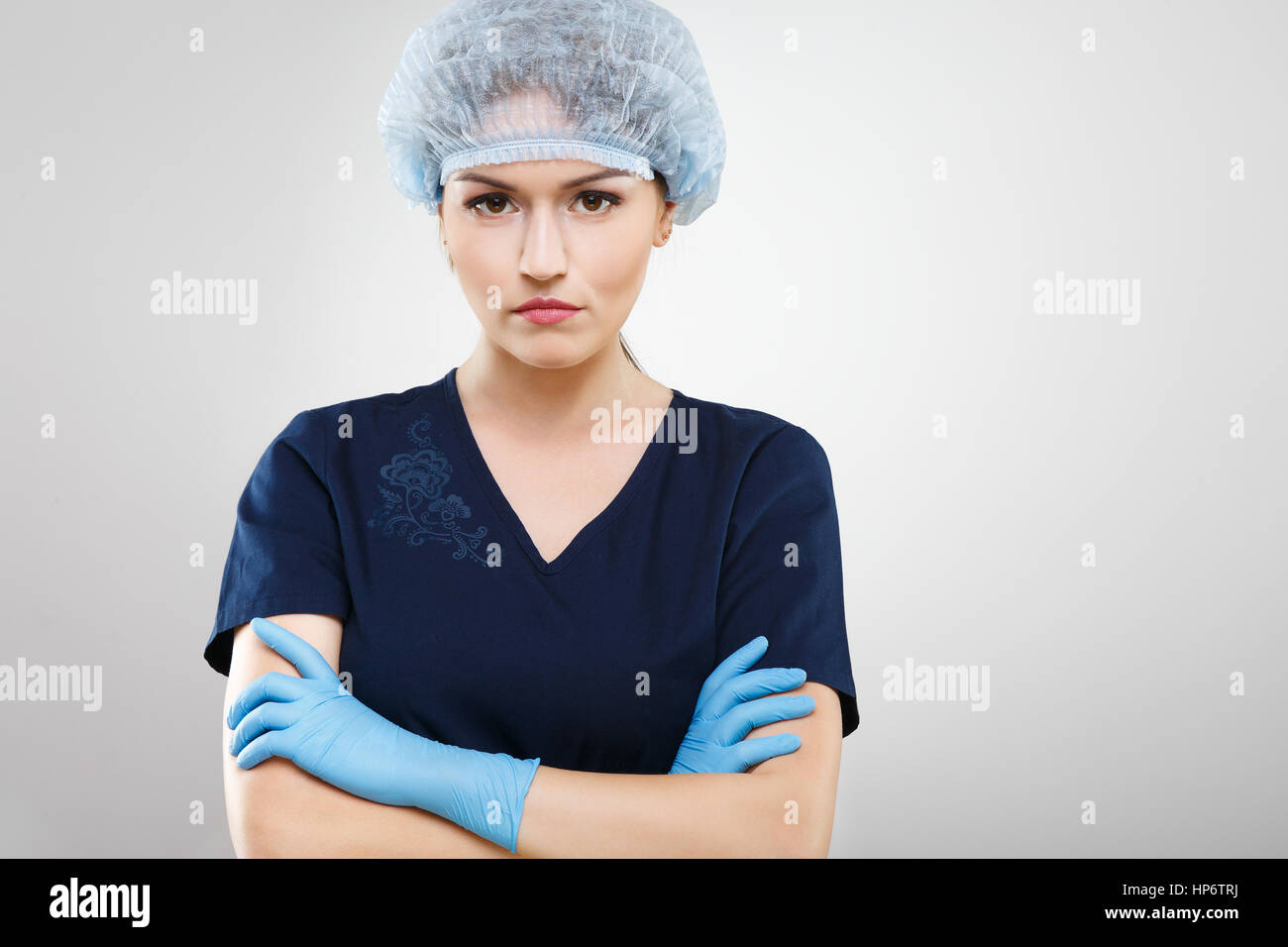 Beautiful nurse in blue medical uniform Stock Photo - Alamy