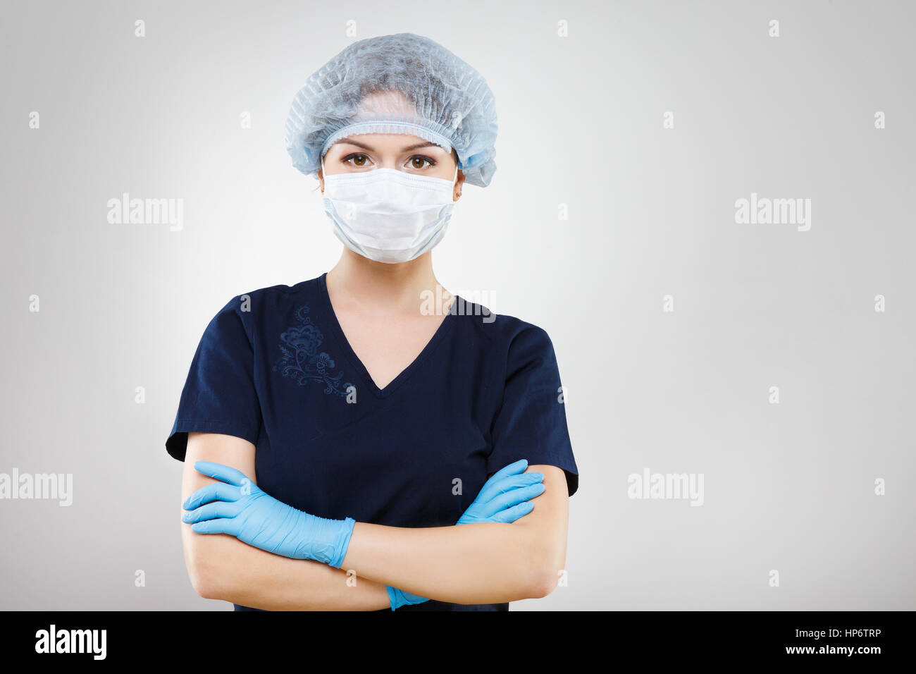 Beautiful nurse in blue medical uniform Stock Photo - Alamy