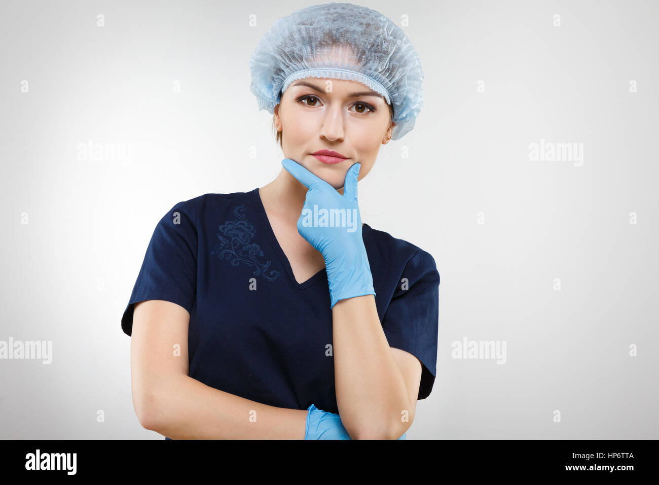 Pretty girl in medical uniform Stock Photo - Alamy