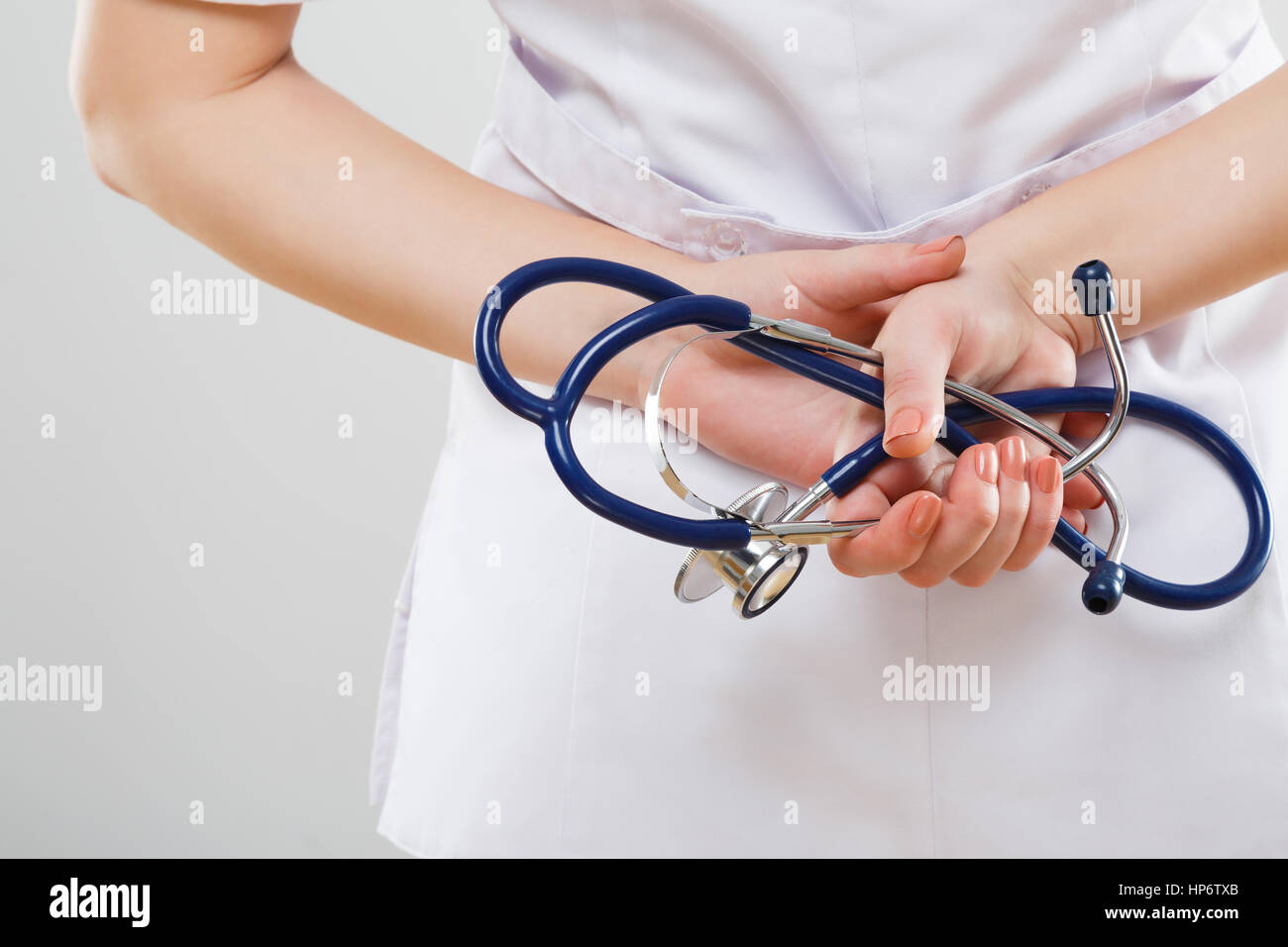 Hands holding stethoscopes Stock Photo - Alamy