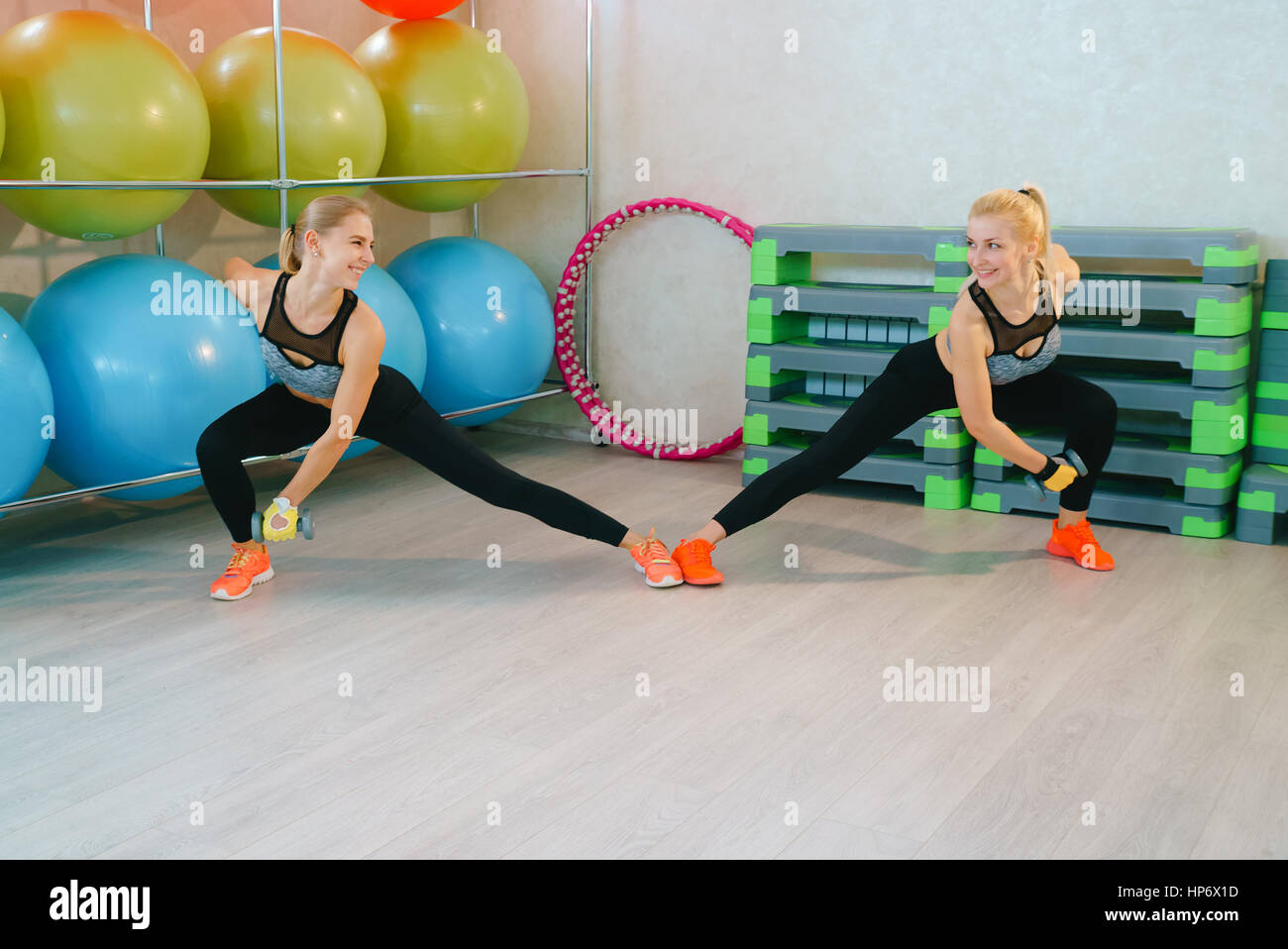 Fitness class exercising in the studio at the gym Stock Photo - Alamy