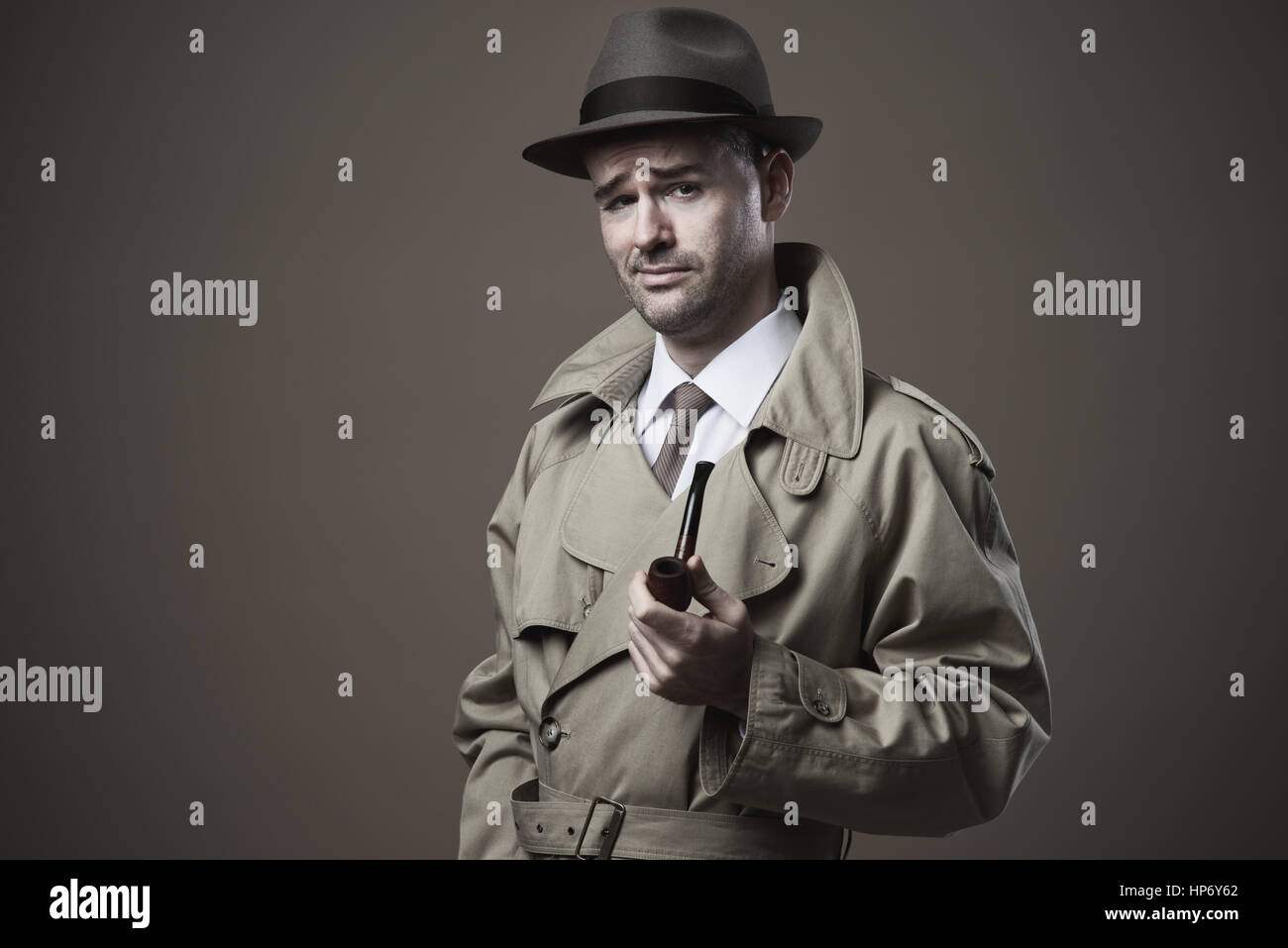 Trench coat detective hi-res stock photography and images - Alamy