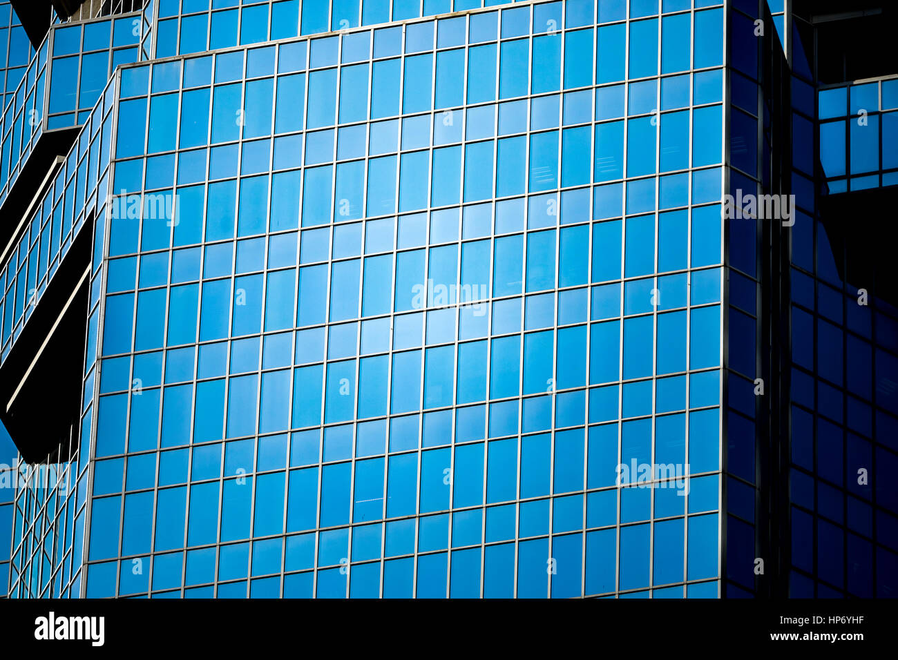 Windows of commercial building in Hong Kong Stock Photo - Alamy