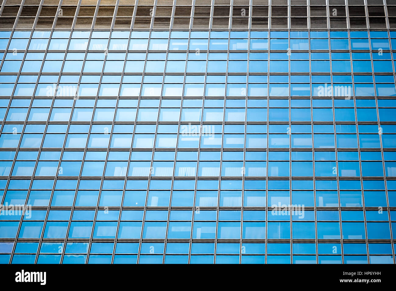 Windows of commercial building in Hong Kong Stock Photo - Alamy