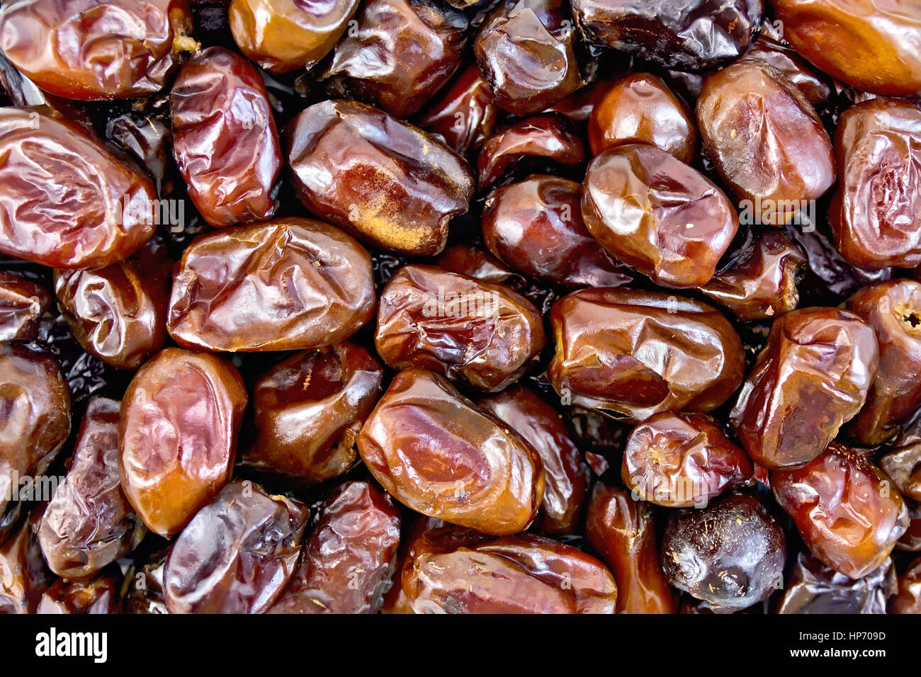 Texture of brown dried fruit of the date palm Stock Photo - Alamy