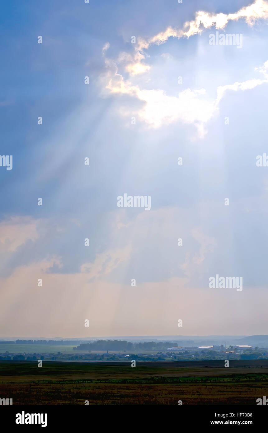 Ray of sunshine through the clouds Stock Photo - Alamy