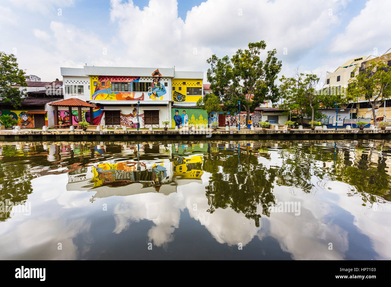 MELAKA, MALAYSIA - JANUARY 17, 2017: Street art reflects on the water ...