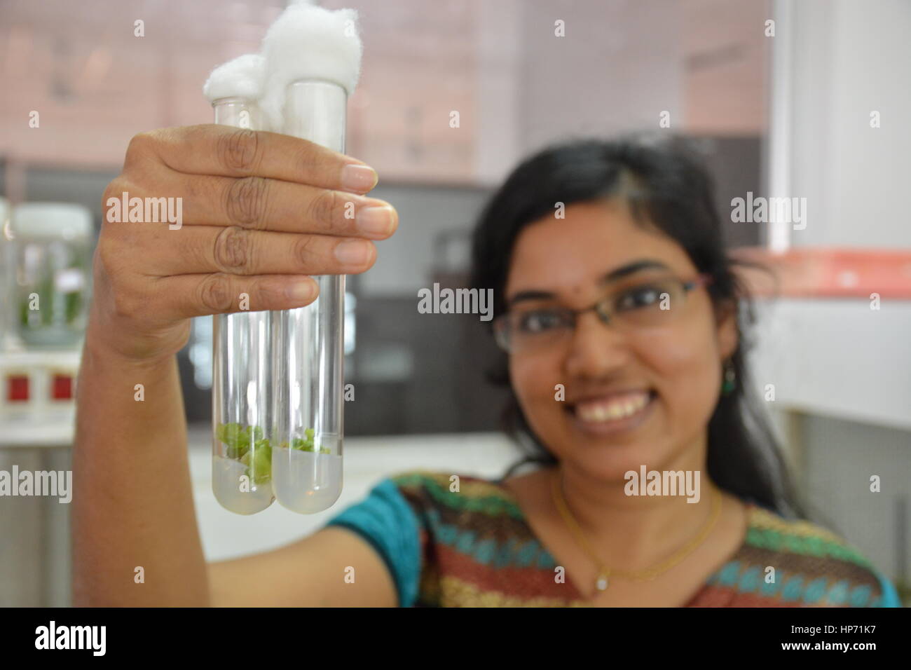 Mumbai, India - October 28, 2015 - Woman showing results of biogenetic ...