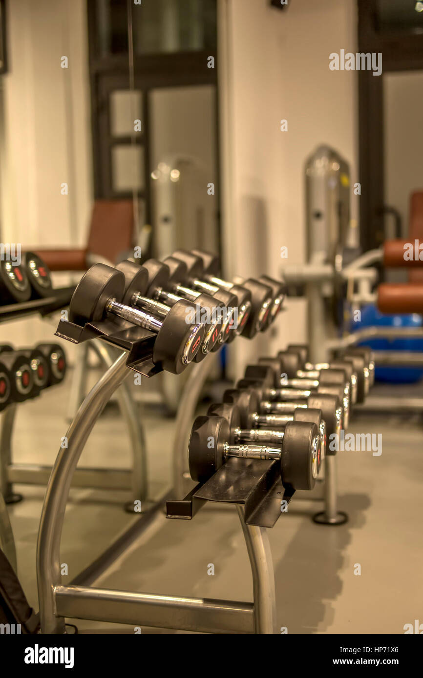 Dumbbell in the gym Stock Photo - Alamy