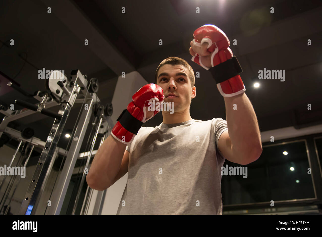 Young man training boxing in the gym Stock Photo - Alamy
