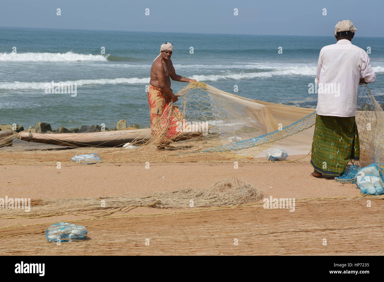Goa, India - November 4, 2015 - Fishermen catching fishes the ...