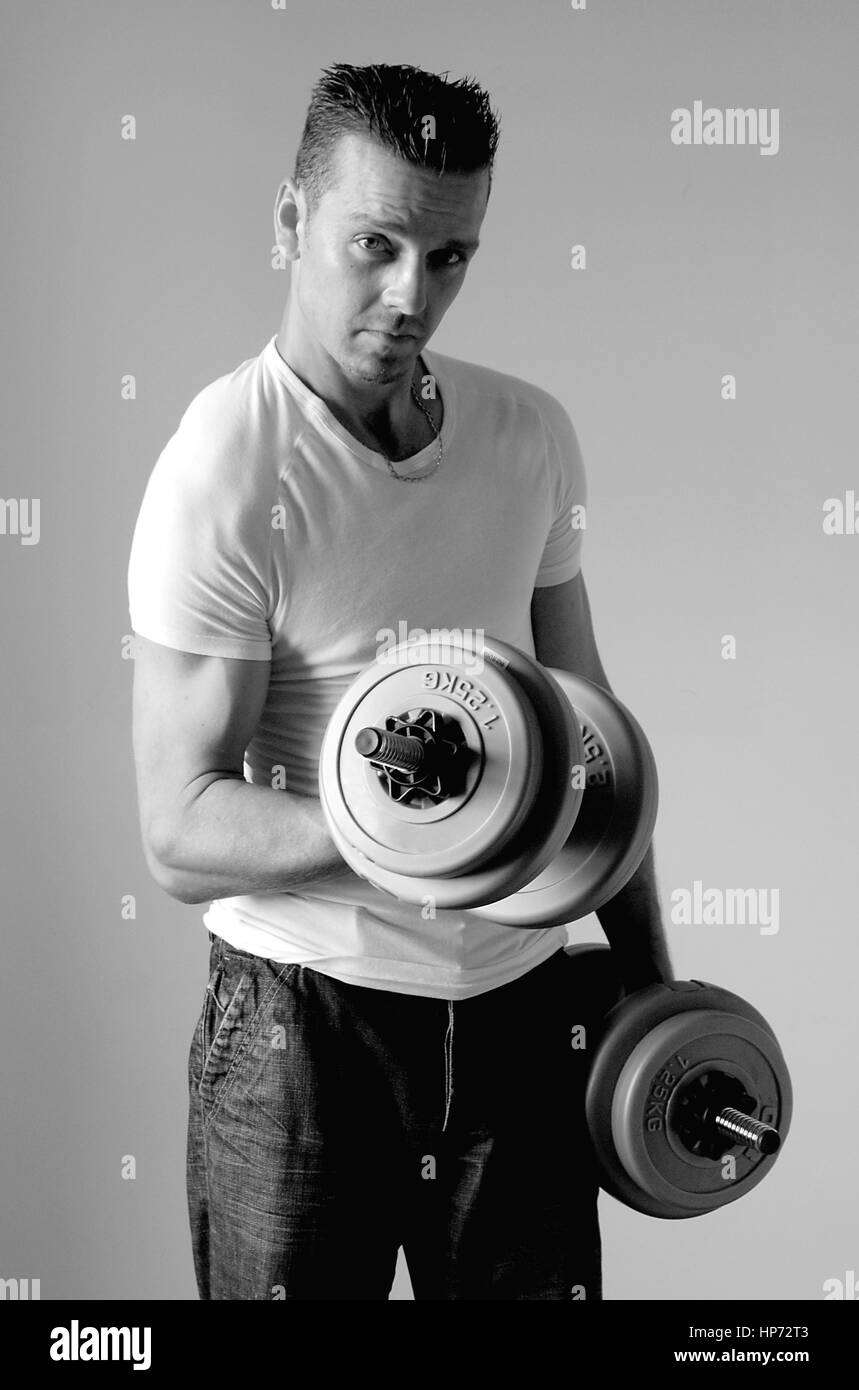 Young black man home Black and White Stock Photos & Images - Alamy