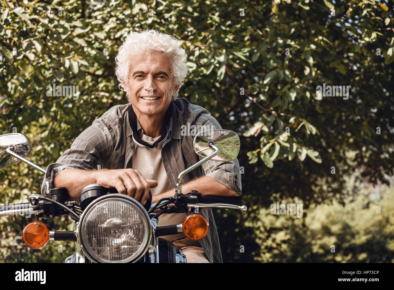Old timey man riding bike hi-res stock photography and images - Alamy