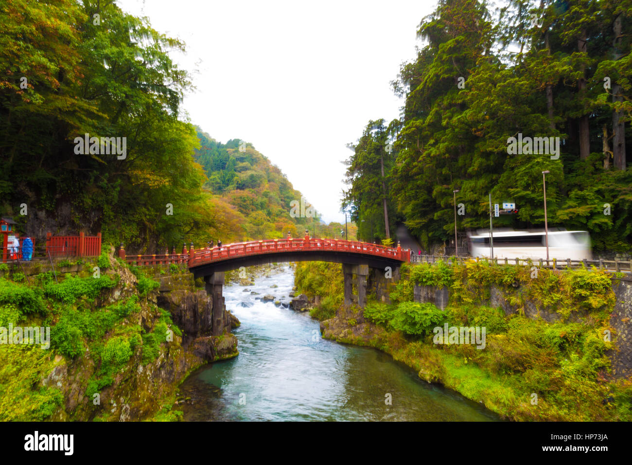 The red Shinkyo Sacred Bridge in autumn, the main way to the Futarasan Shrine in Nikko, Japan ...