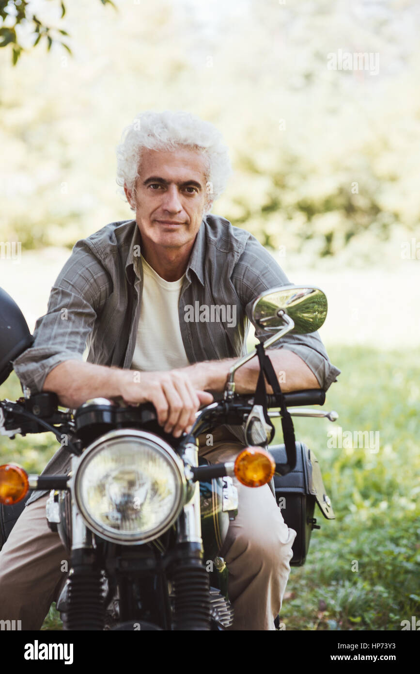 Old man on motorcycle hi-res stock photography and images - Alamy