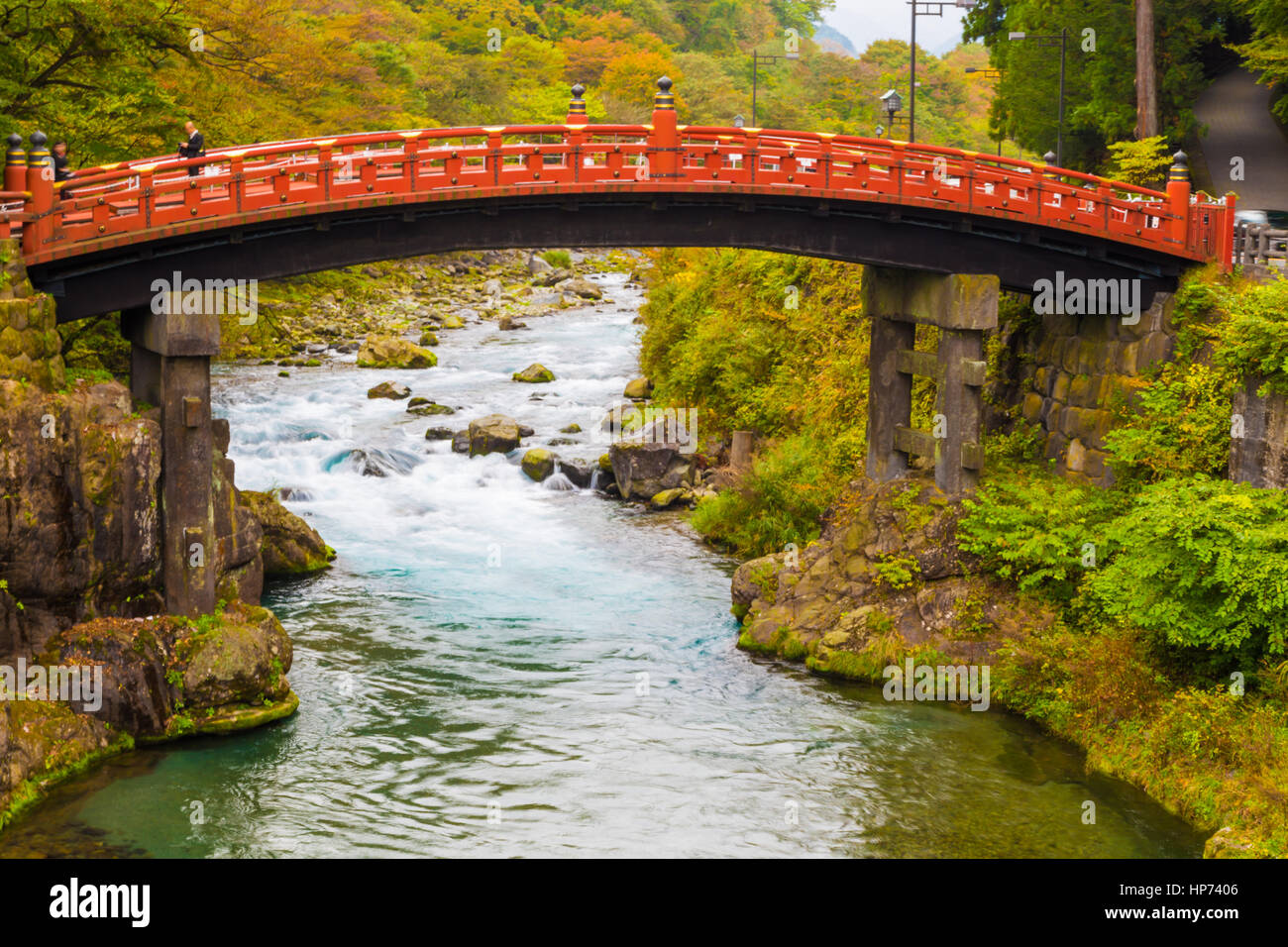 The red Shinkyo Sacred Bridge in autumn, the main way to the Futarasan Shrine in Nikko, Japan ...