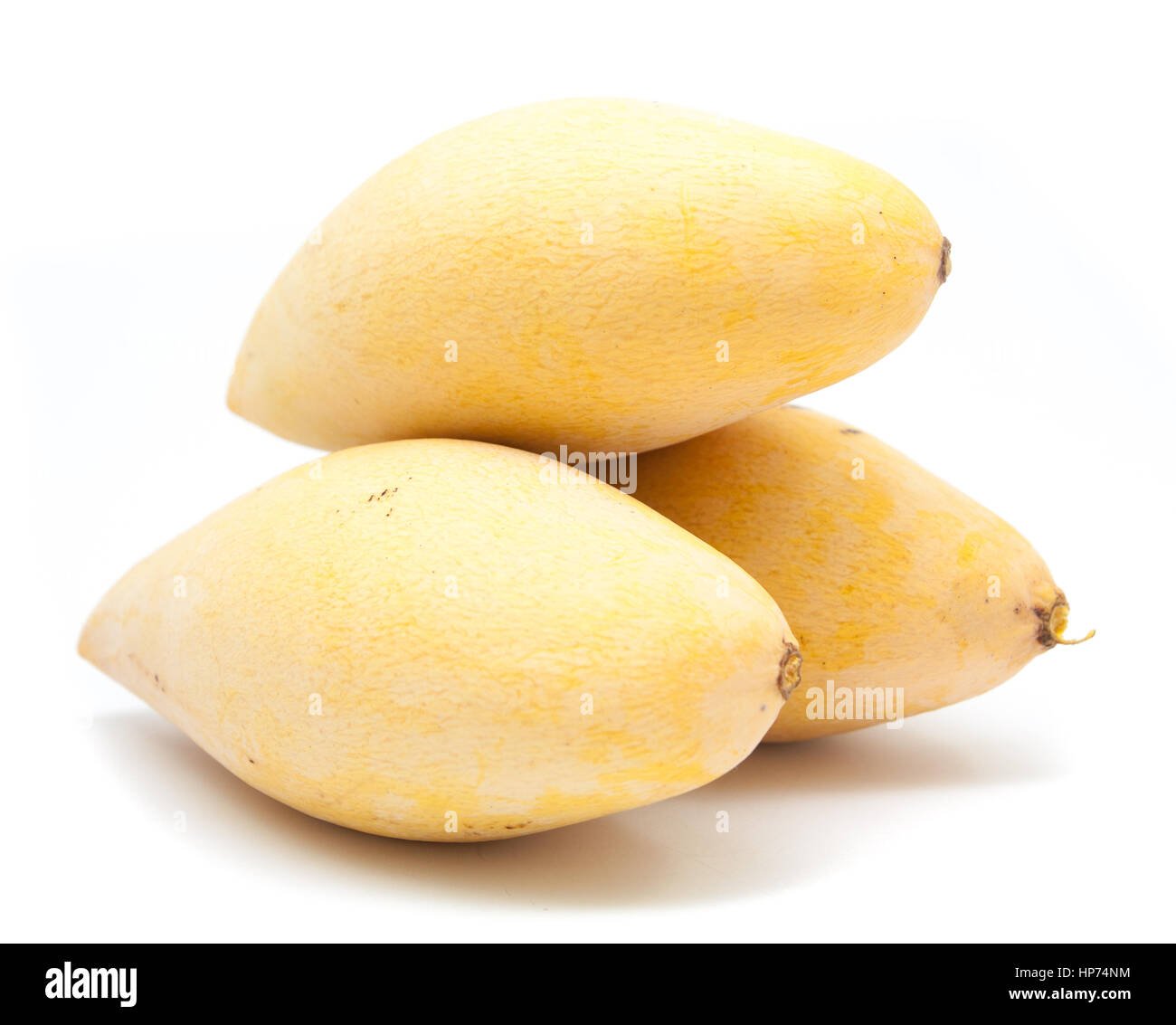 yellow three mango isolated on white background Stock Photo - Alamy