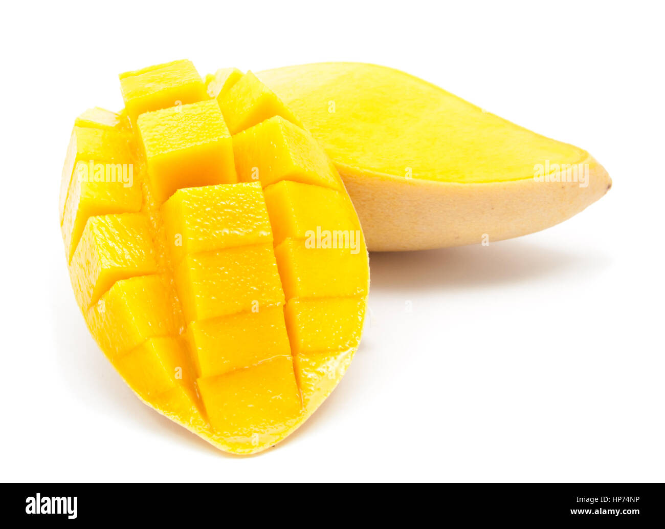 slice of mango on a white background Stock Photo - Alamy