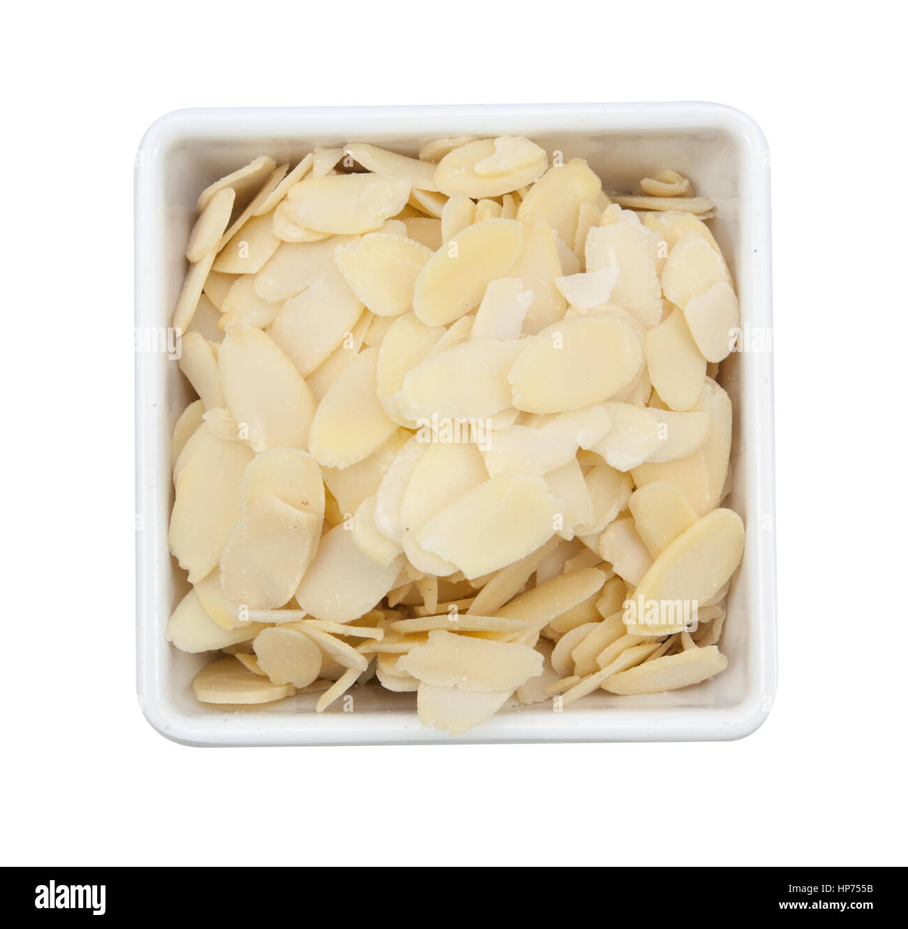 Almond slide in a wood bowl isolated on white background Stock Photo ...