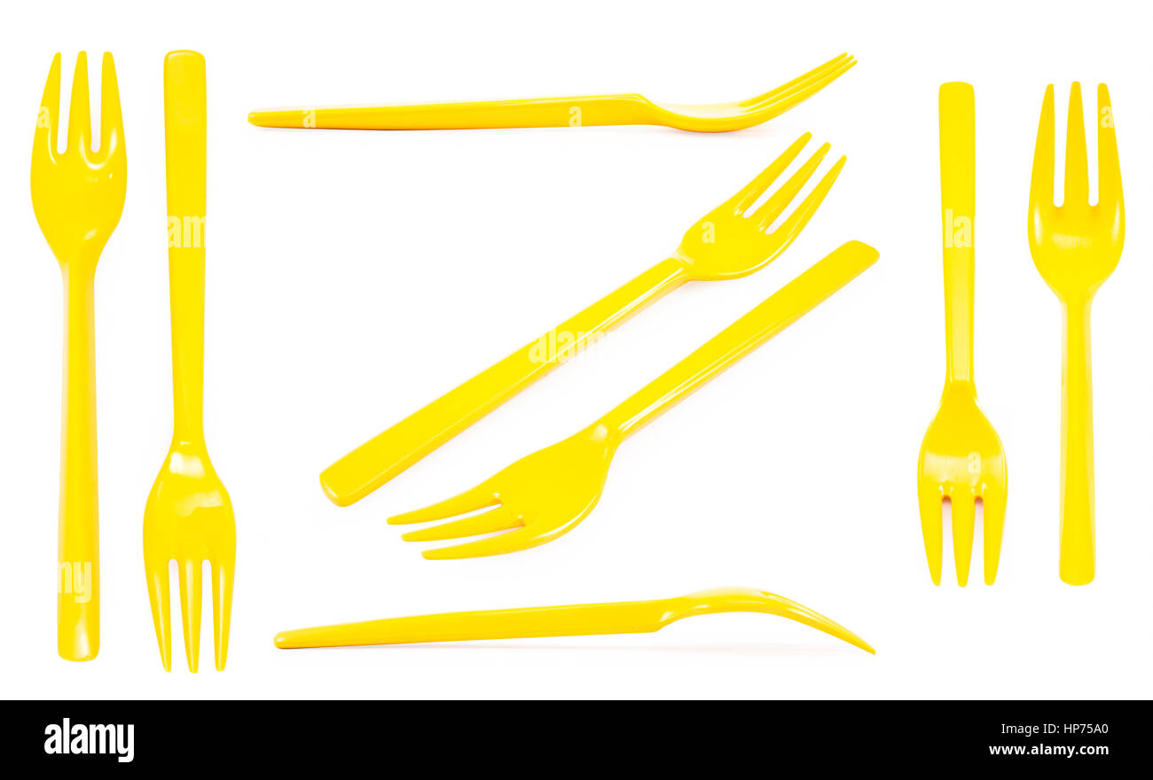 Collection yellow plastic forks isolated on white background Stock ...