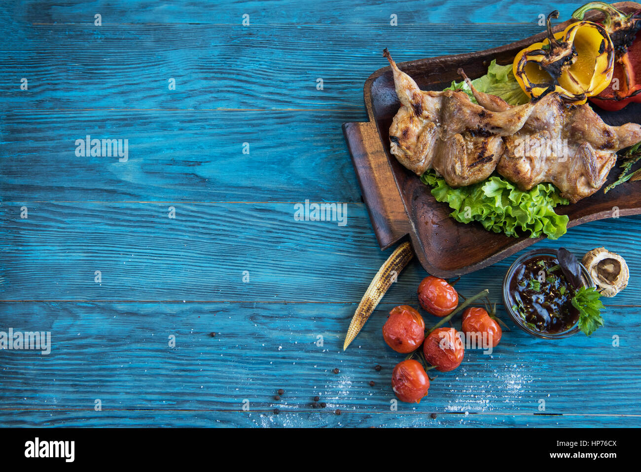 Grilled quail meat Stock Photo - Alamy