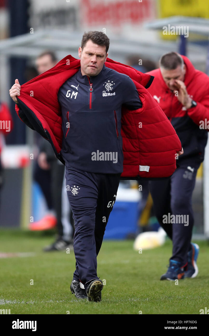 Rangers caretaker manager Graeme Murty takes off his coat at half-time ...