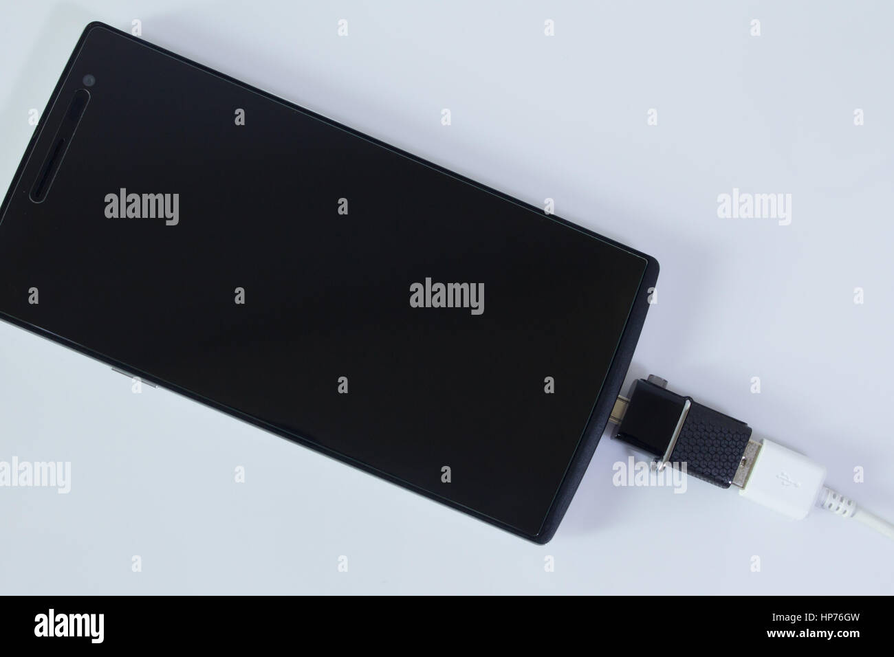 Mobile smart phone is connecting to USB OTG Stock Photo - Alamy
