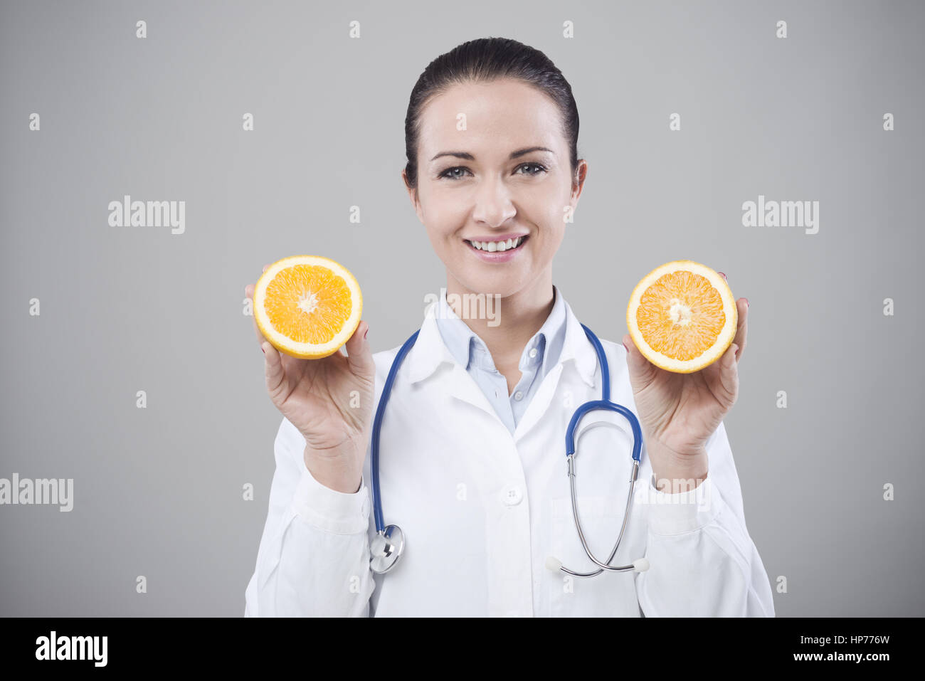 Doctor with orange hi-res stock photography and images - Alamy