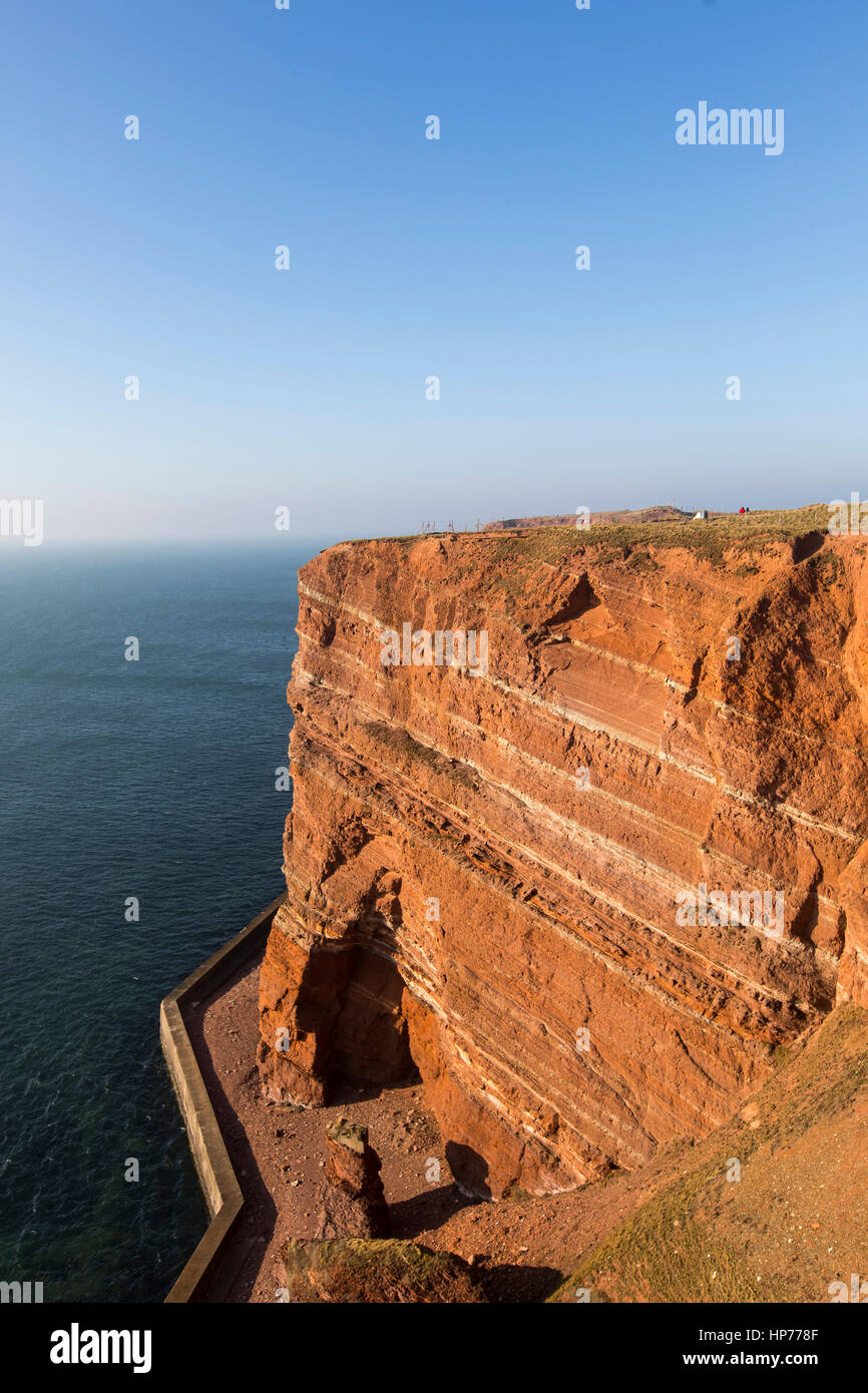 The red steep coast line of Helgoland, an German Island in the North ...