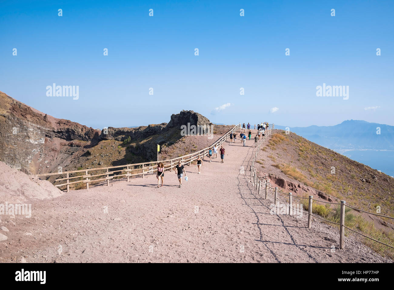 Mount Vesuvius, Italy - August 30, 2016: Tourists walk around the ...